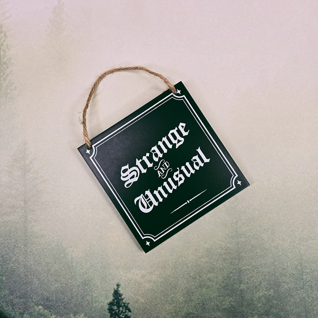 Strange and Unusual Hanging MDF Sign